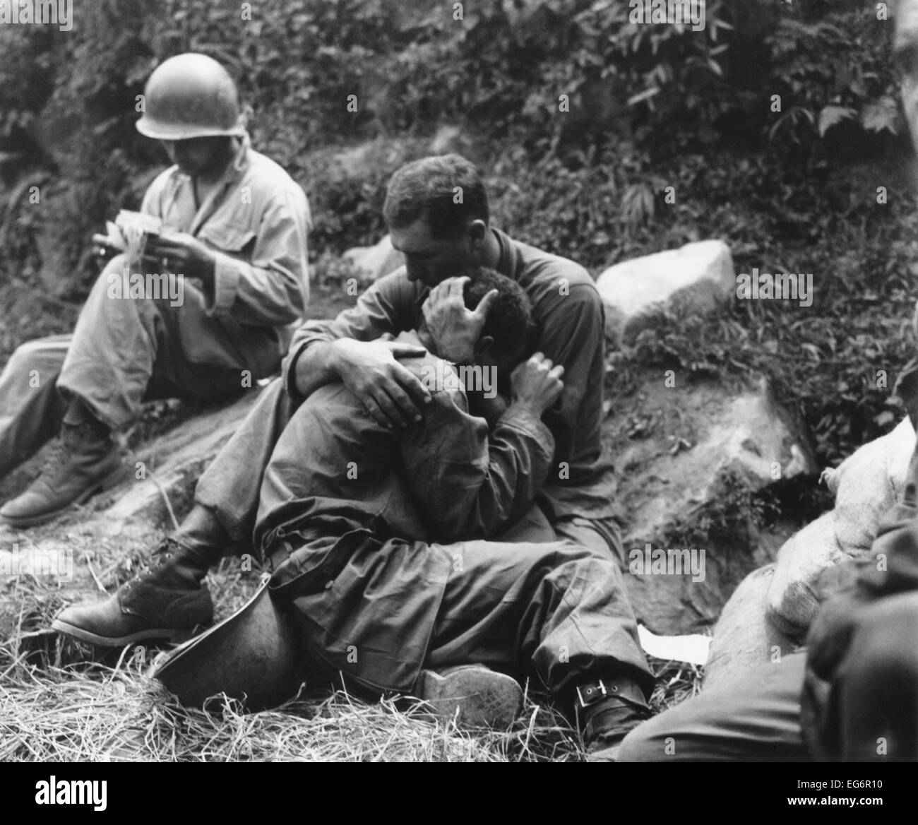 A grief stricken American infantryman whose buddy has been killed in ...