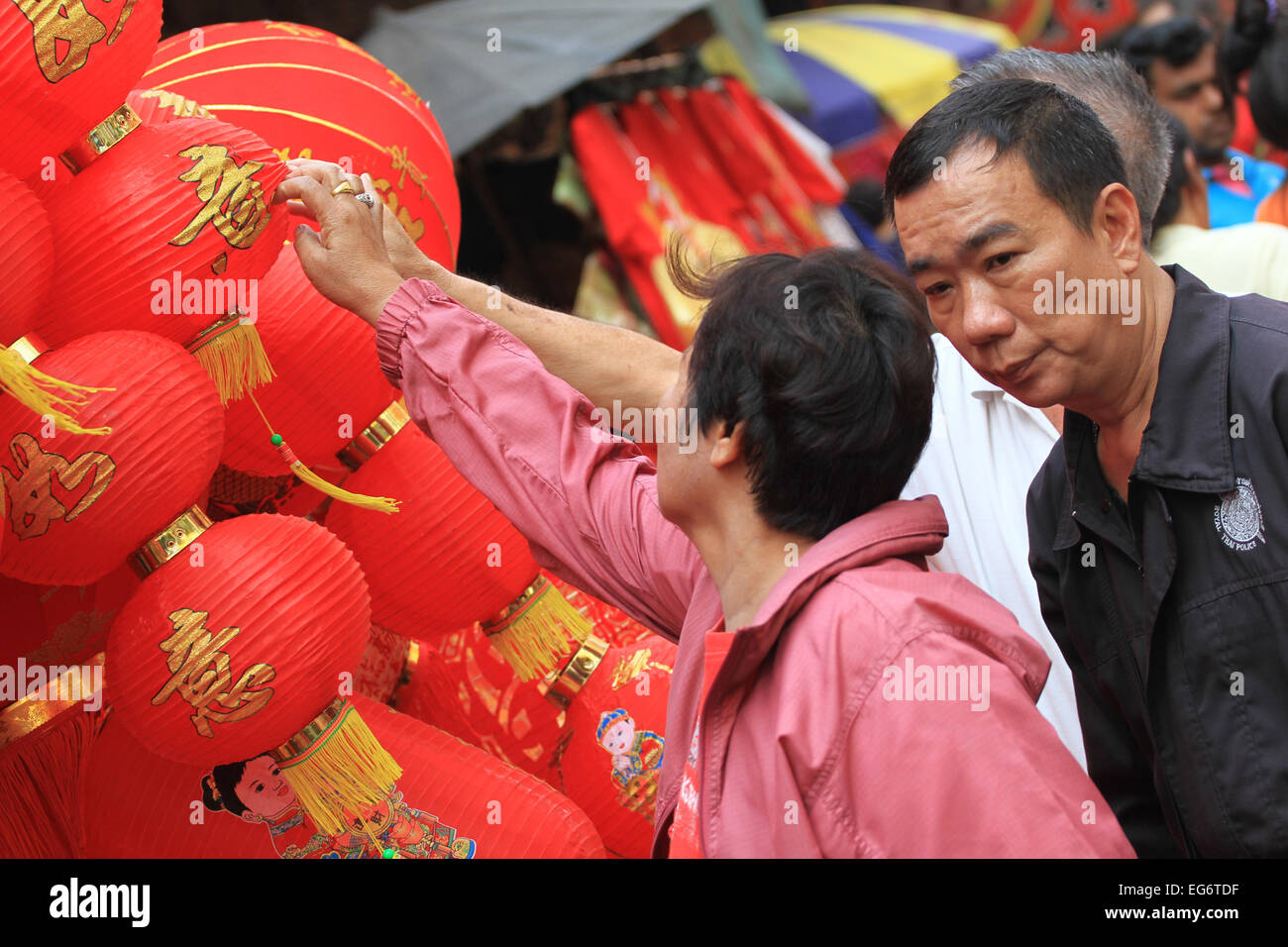 Thai-Chinese people selects a lamp for the Chinese New Year. © Vichan ...