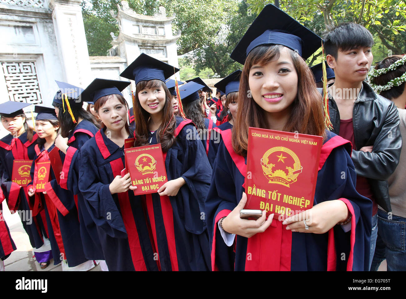 Hanoi, Vietnam. 20th Nov, 2014. Young Vietnamese students stands with ...