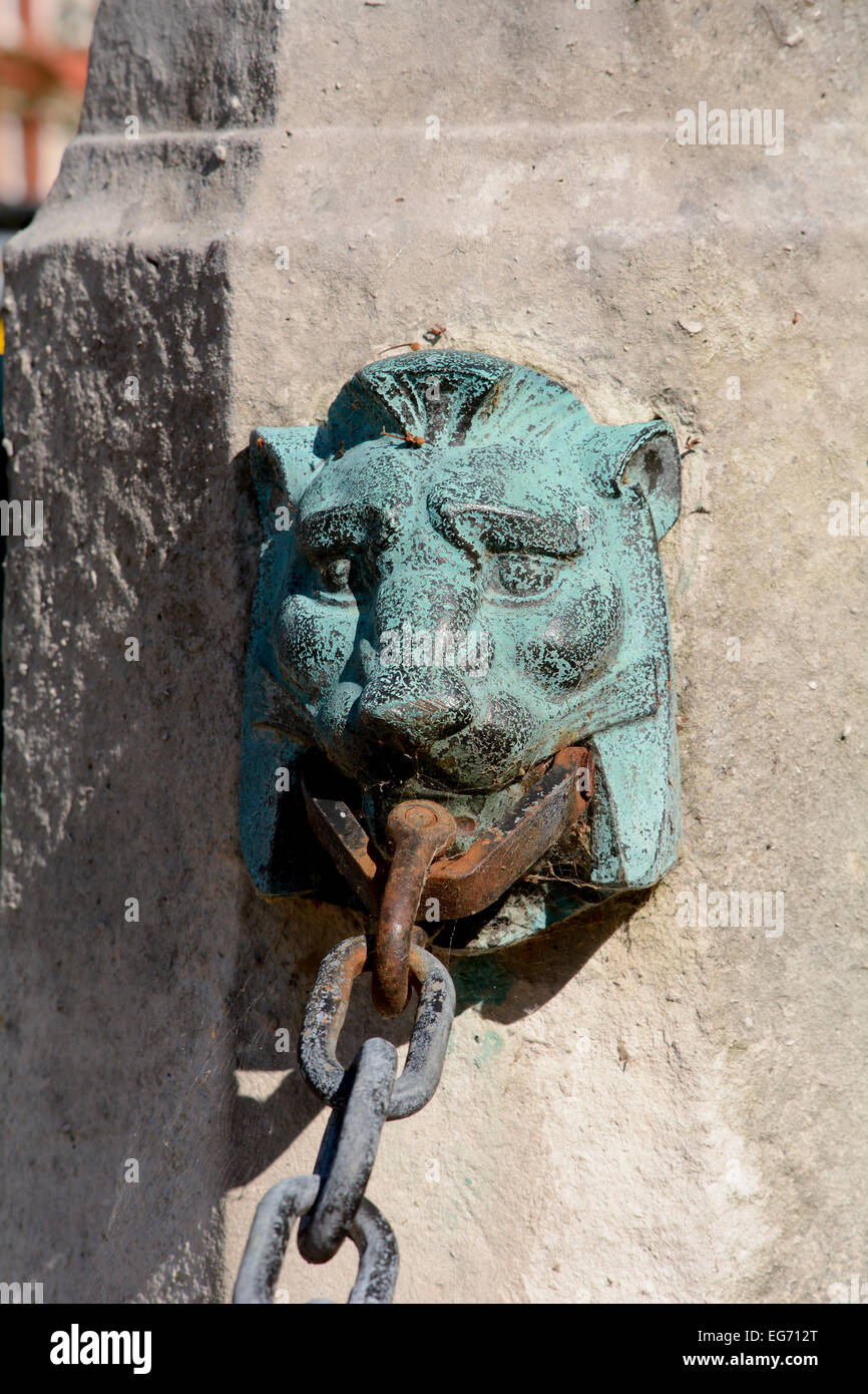 Lion's head gargoyle holding chain in mouth around War Memorial Statue ...