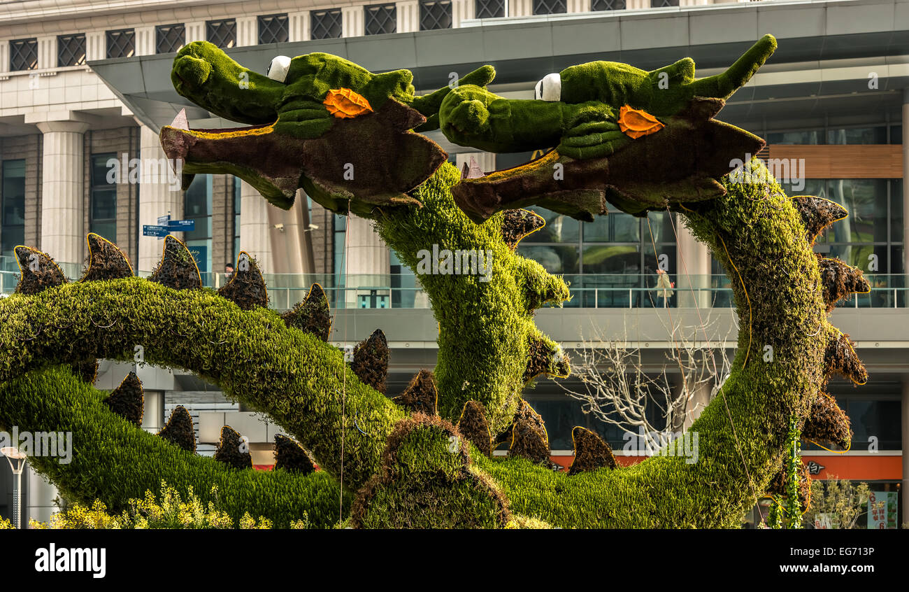 Shanghai, China - April 7, 2013: dragons sculptured trees in pudong at ...