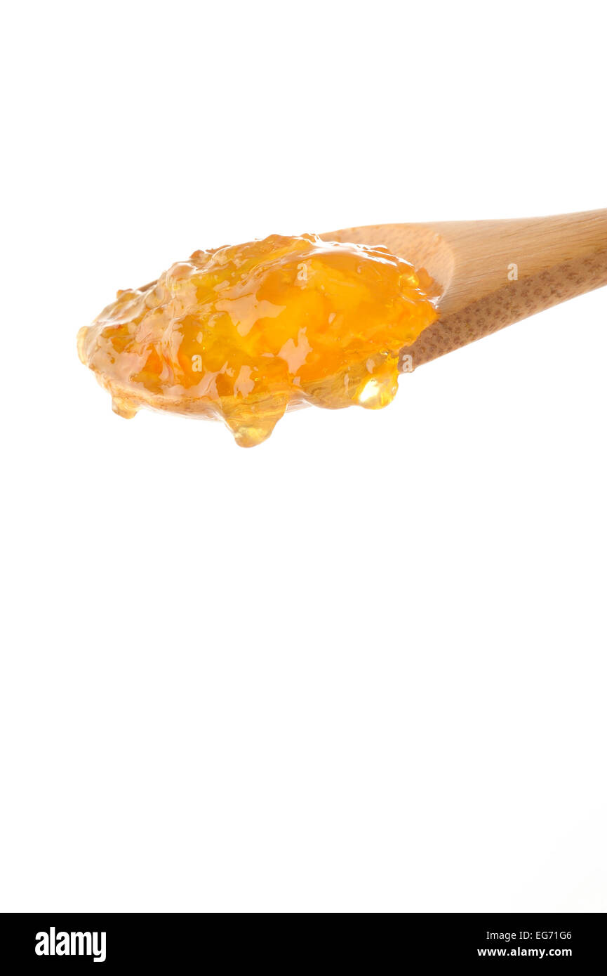 Wooden spoon in fruit jam Cut Out Stock Images & Pictures - Alamy