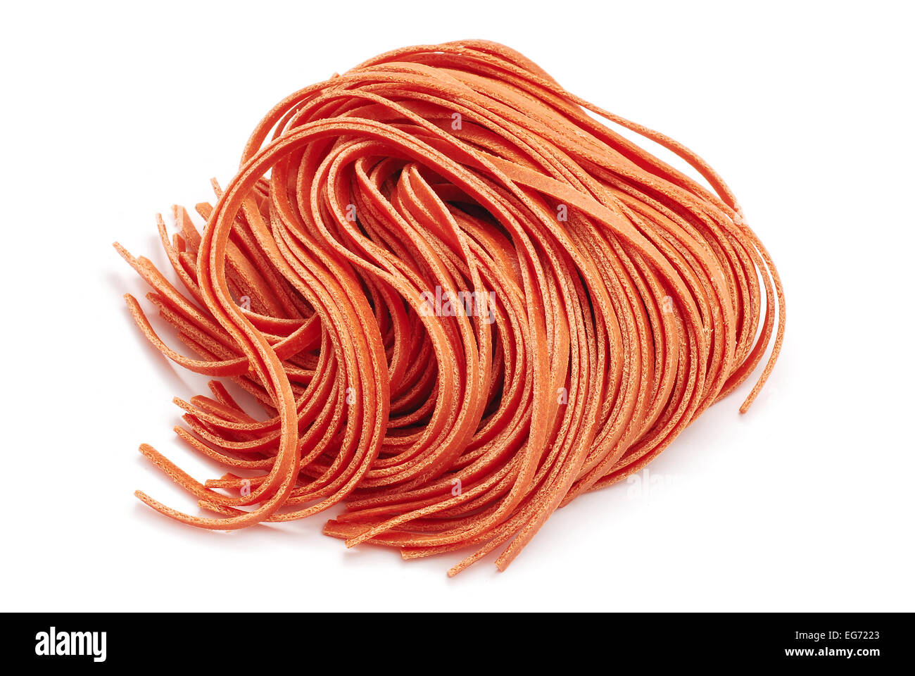 Long raw pasta on red hi-res stock photography and images - Alamy