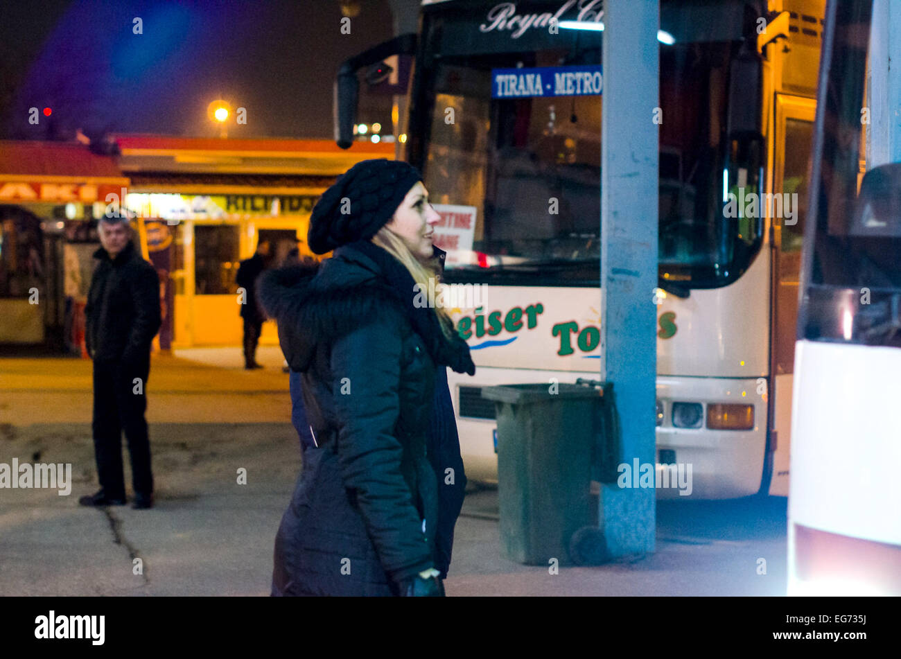 A woman says goodbye to a man who boarded a bus for Belgrade on 16 ...