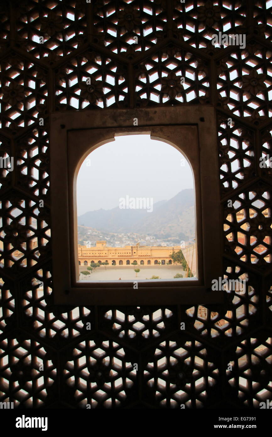 View through the silhouetted window frame at Amer Palace (Amber Fort ...