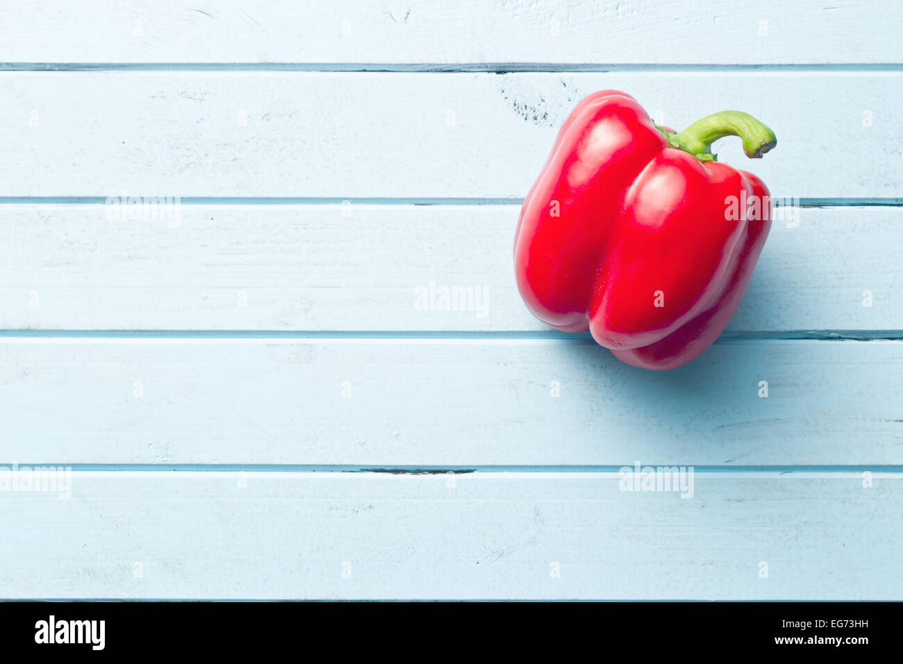red pepper on kitchen table Stock Photo - Alamy
