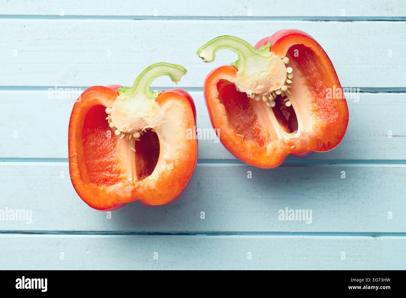 top view of halved red bell pepper on table Stock Photo - Alamy