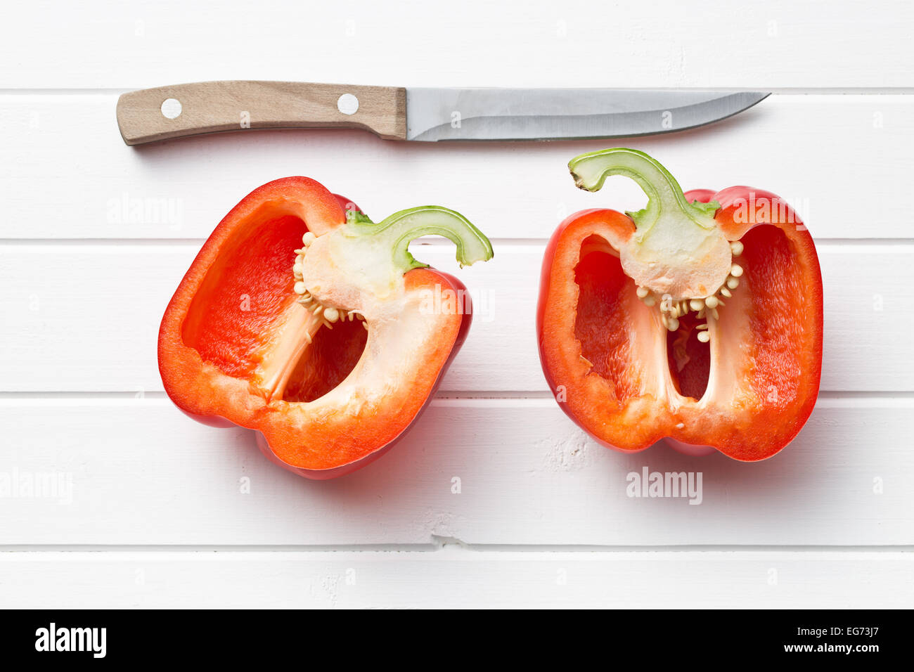 top view of halved red bell pepper on table Stock Photo - Alamy