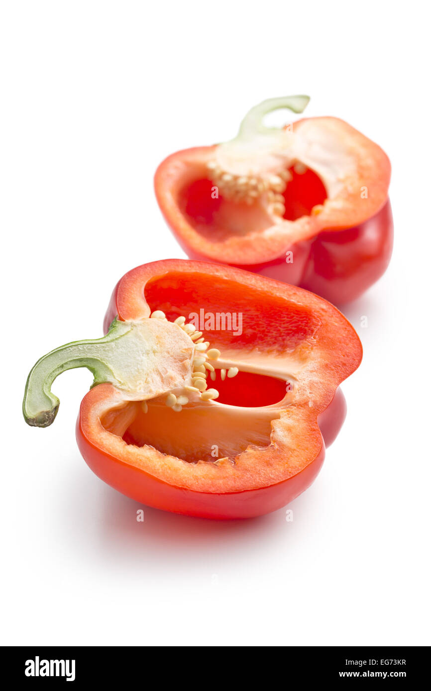 halved red bell pepper on white background Stock Photo - Alamy
