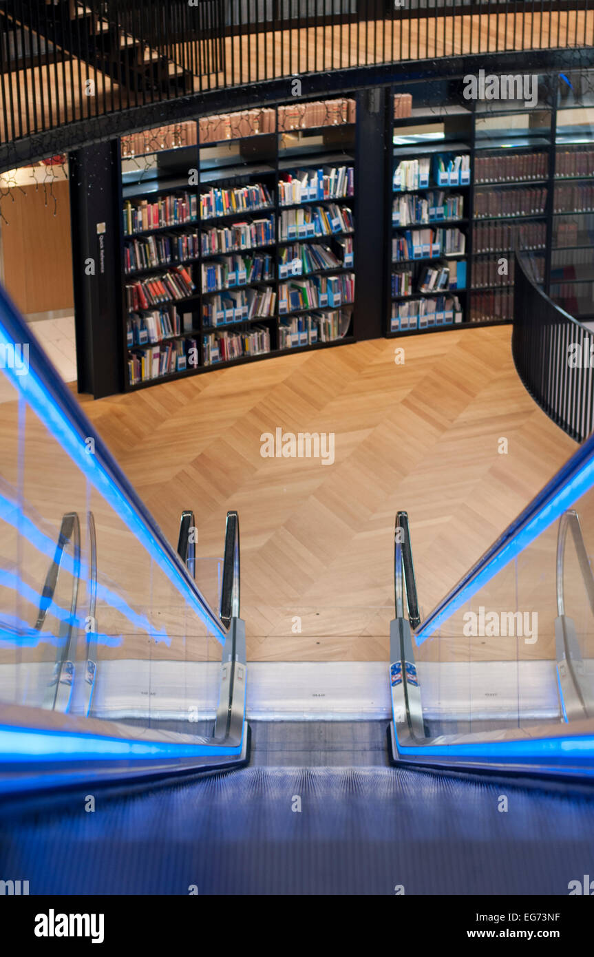 Modern escalator with neon lights, Birmingham Library rotunda Stock ...