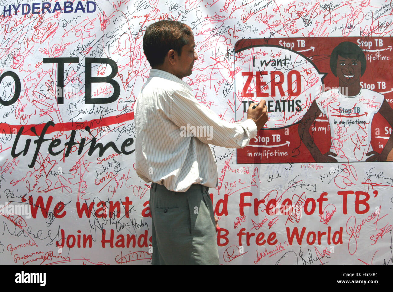 An unidentified man signing the signature campaign for Tuberculosis ...