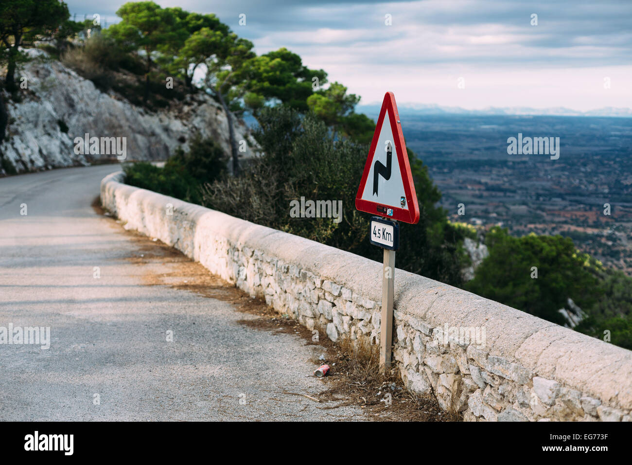 Spain, Mallorca, Felanitx, winding road sign Stock Photo - Alamy