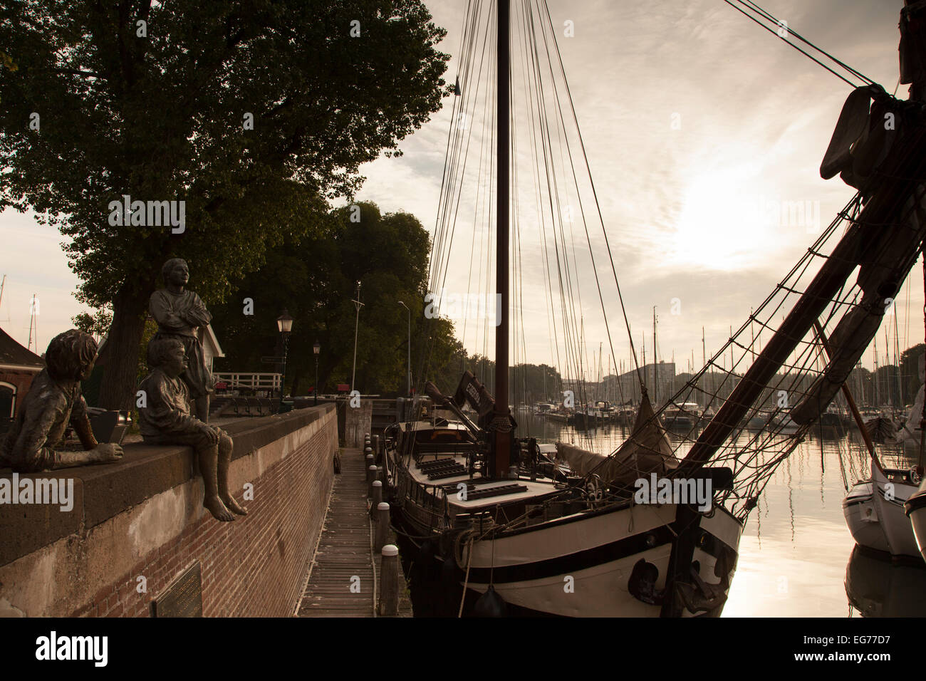 Netherlands, Ijsselmeer, Hoorn, sailing ships and bronze statues at ...