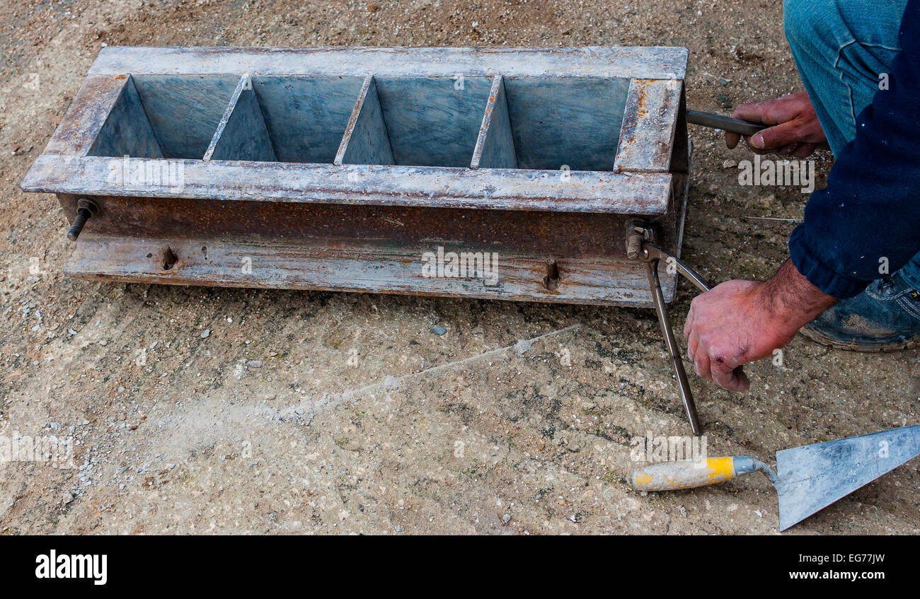 worker prepares the metal mold for concrete test Stock Photo - Alamy