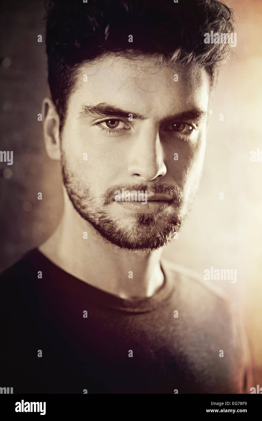 Portrait of serious young man Stock Photo - Alamy