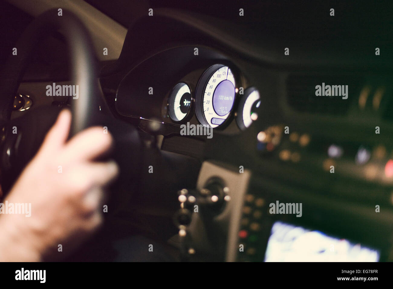 Hands driving a car Stock Photo - Alamy