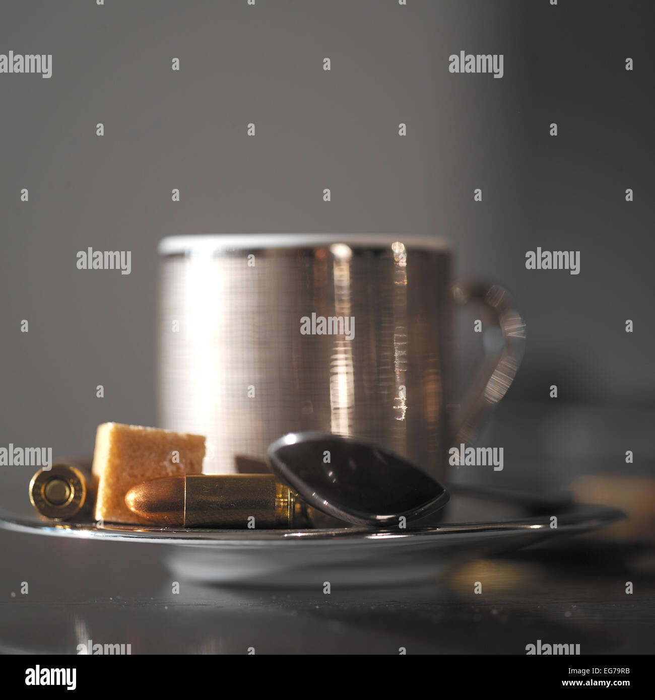 Coffee Cup and Bullets Stock Photo - Alamy