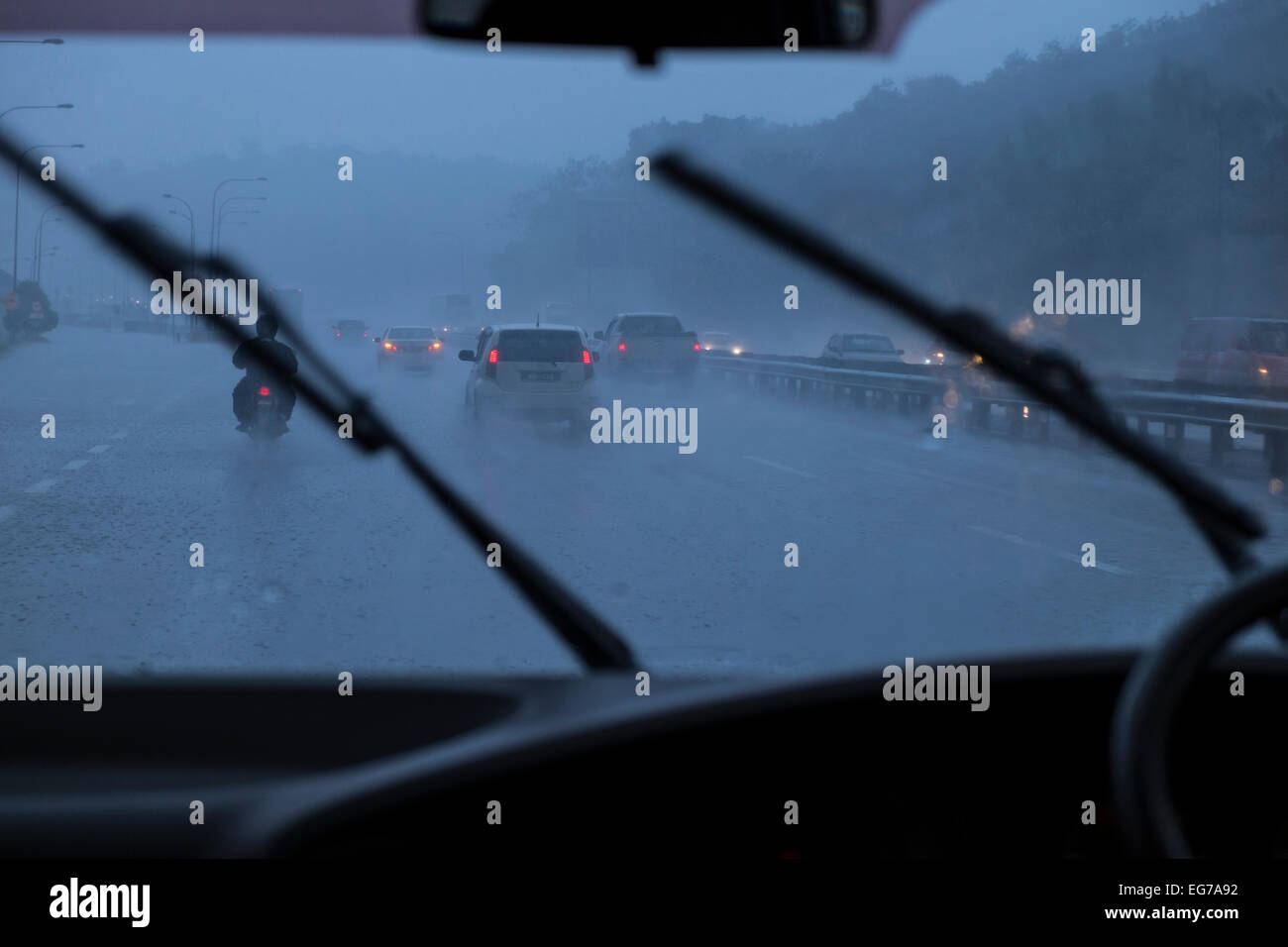 Driving in heavy rain on a highway in Malaysia Stock Photo - Alamy
