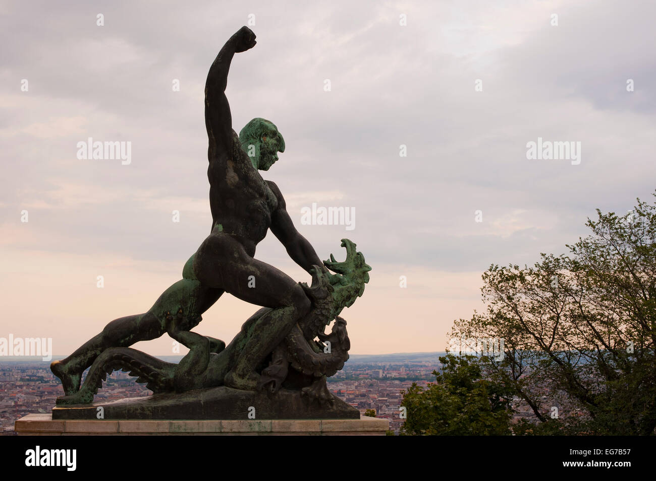 Bronze statue of a mythological figure fighting a dragon at Citadel ...