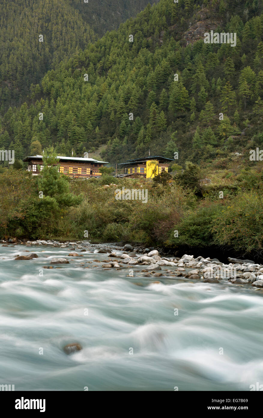 BU00161-00...BHUTAN - A brightly colored farm house above the Paro ...