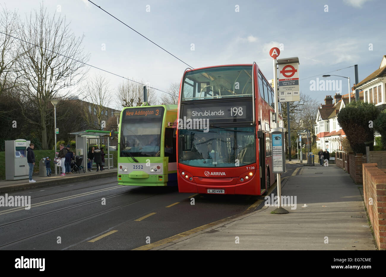 Tram Overtaking a Bus in Addiscombe Road Croydon Stock Photo - Alamy