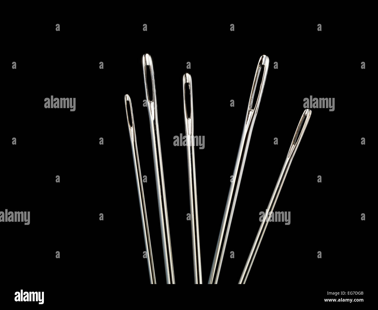 Silver Needles on Black background Stock Photo - Alamy