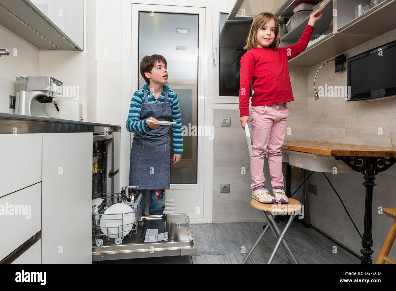 Child dishwasher hi-res stock photography and images - Alamy