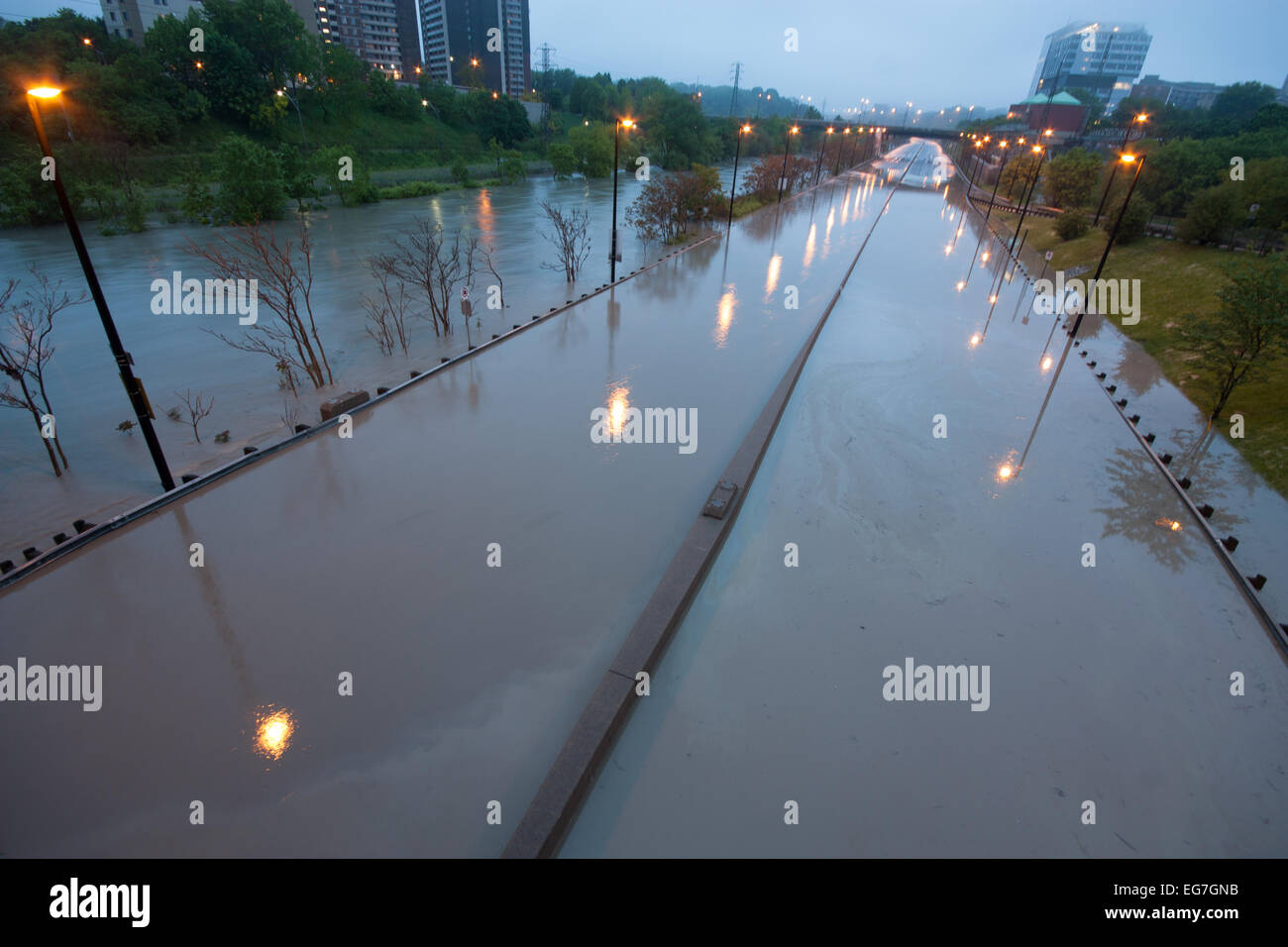 After a series of torrential downpours the Don River floods over the ...