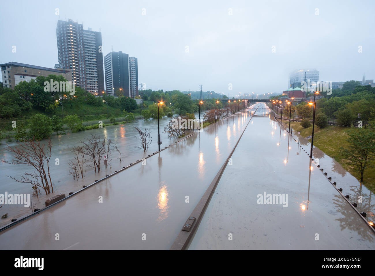 After a series of torrential downpours the Don River floods over the ...