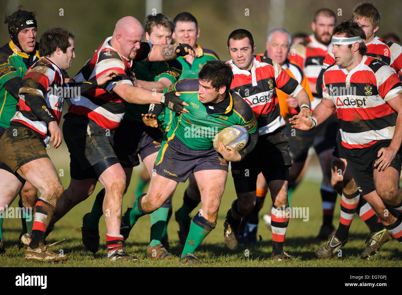 Rugby, player being tackled Stock Photo - Alamy