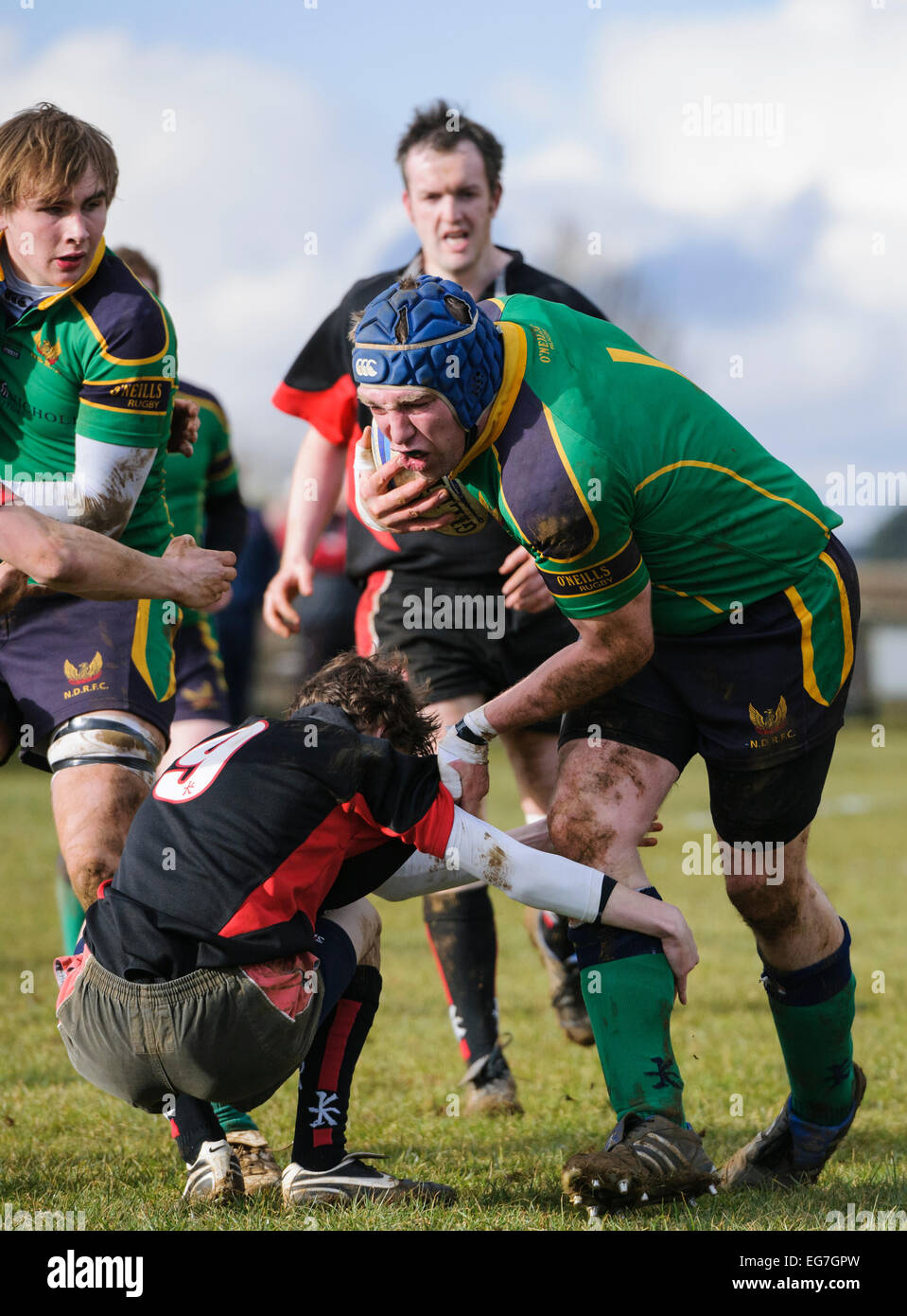 Rugby, player being tackled Stock Photo - Alamy