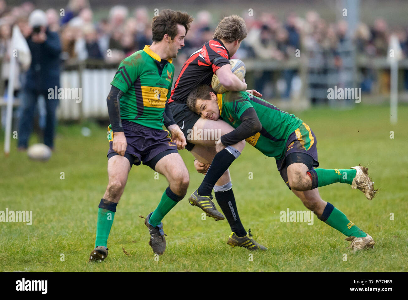 Rugby, player being tackled Stock Photo - Alamy