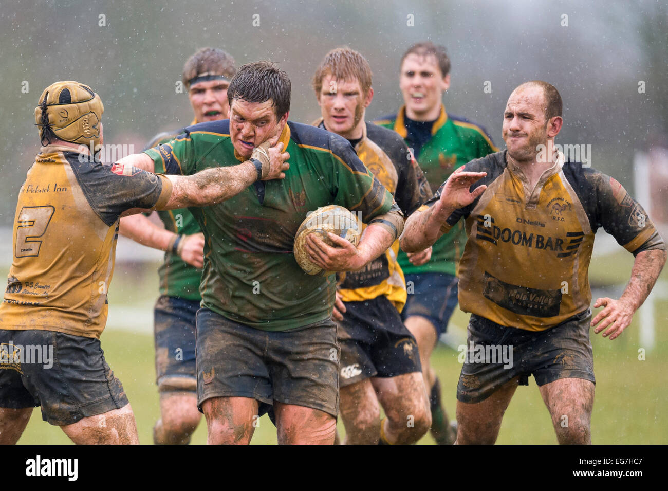 Rugby, player being tackled Stock Photo - Alamy