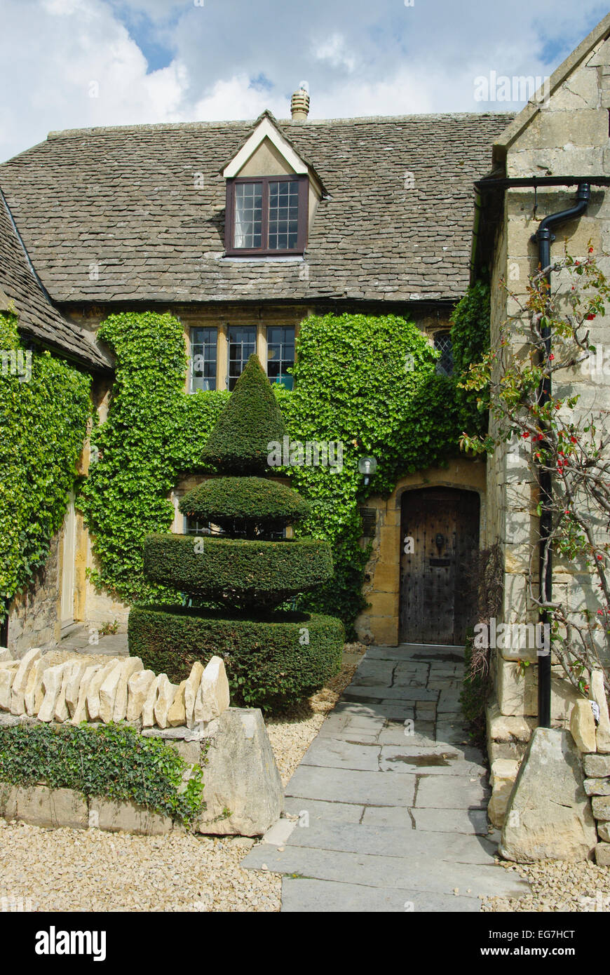 Secluded courtyard just off the High Street in the Cotswolds village of ...