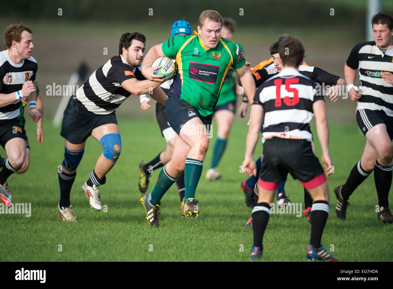 Rugby, player being tackled Stock Photo - Alamy