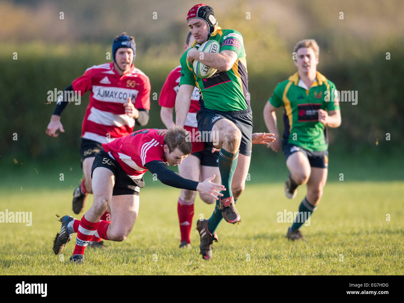 Rugby, player being tackled Stock Photo - Alamy