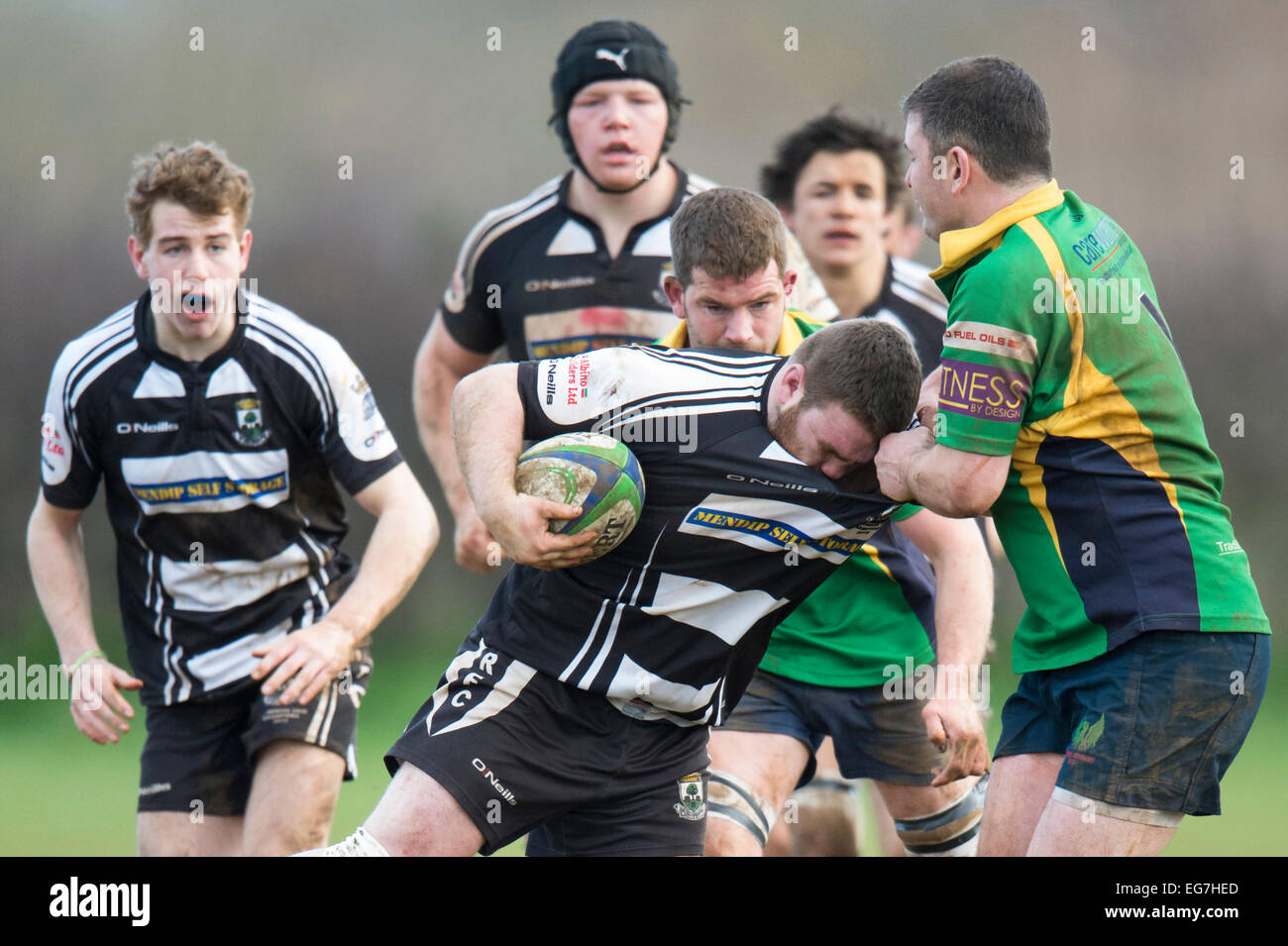 Rugby, player being tackled Stock Photo - Alamy