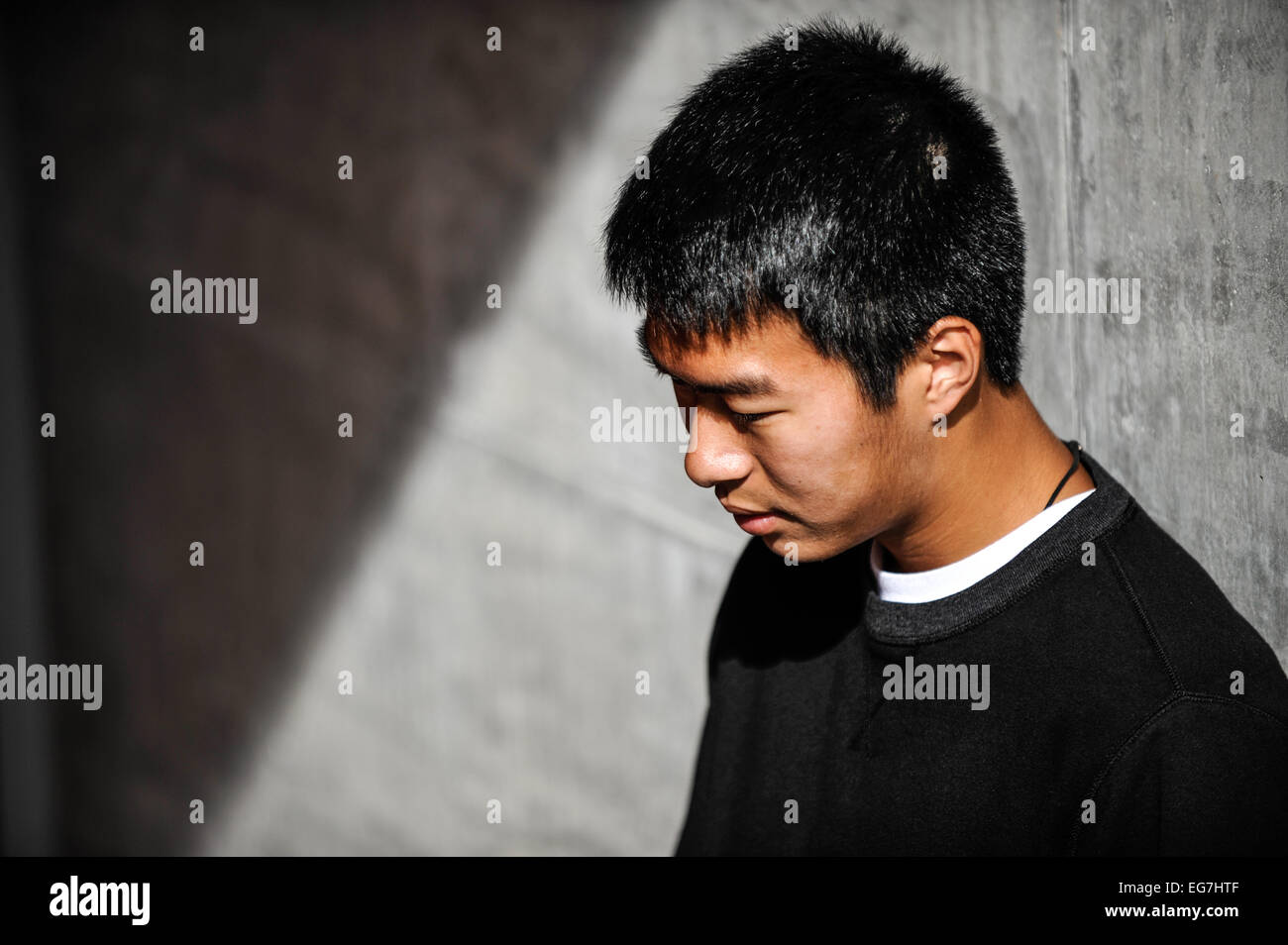 An outdoor portrait of a young and handsome Asian male Stock Photo - Alamy