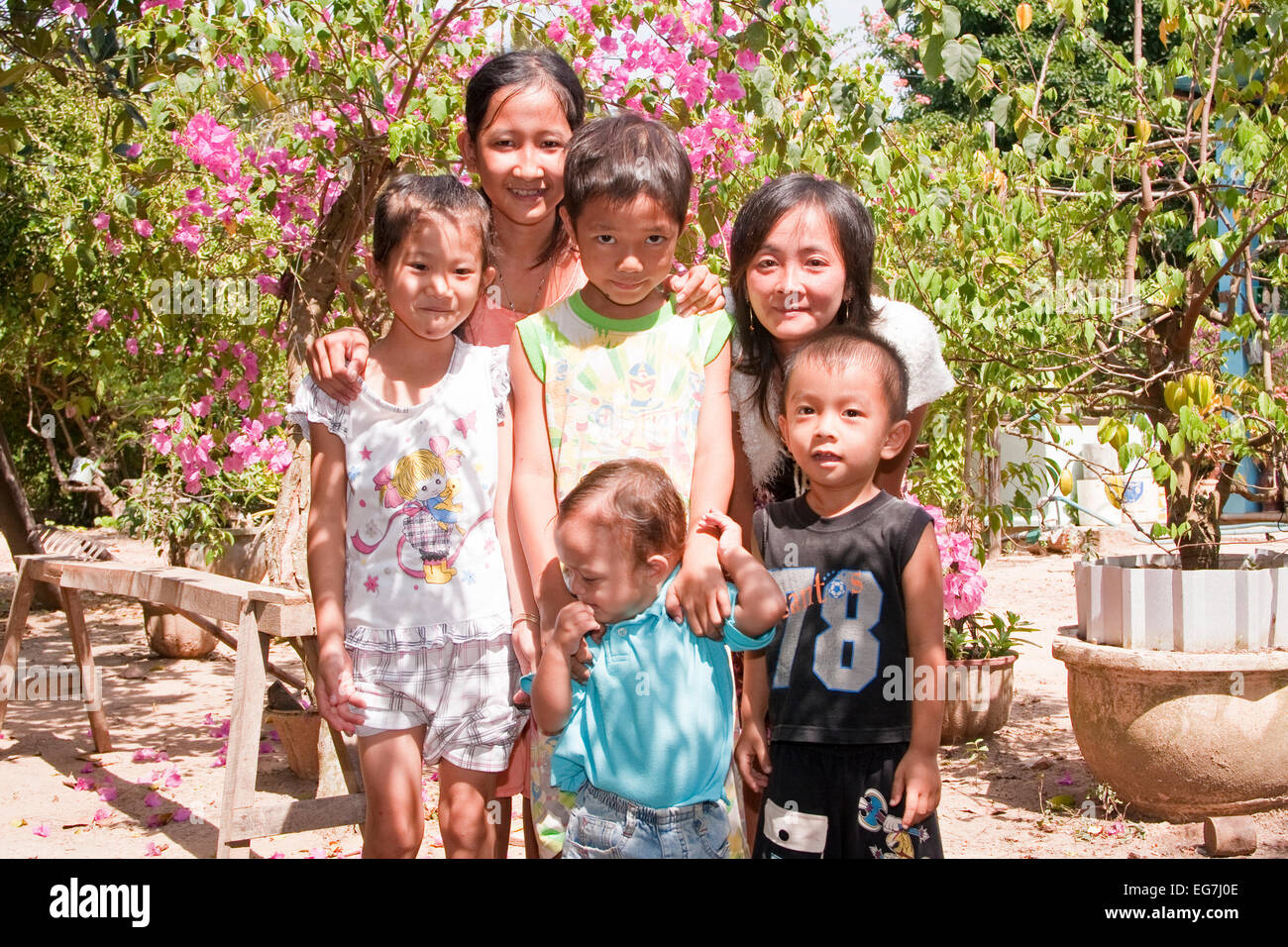 Young girl with small child on the arm, Phu Quoc, Vietnam, Asia Stock ...