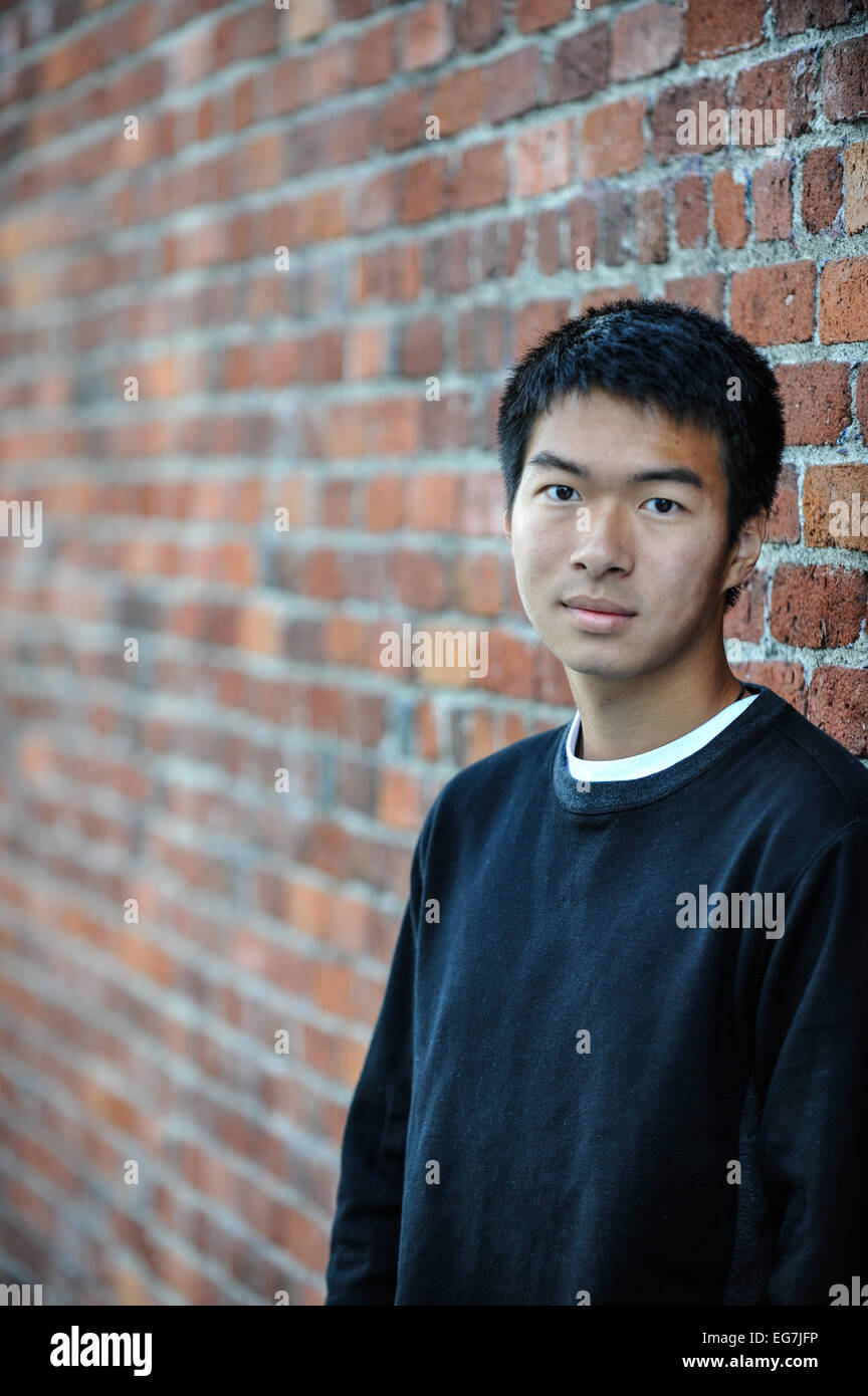 An outdoor portrait of a young and handsome Asian male Stock Photo - Alamy