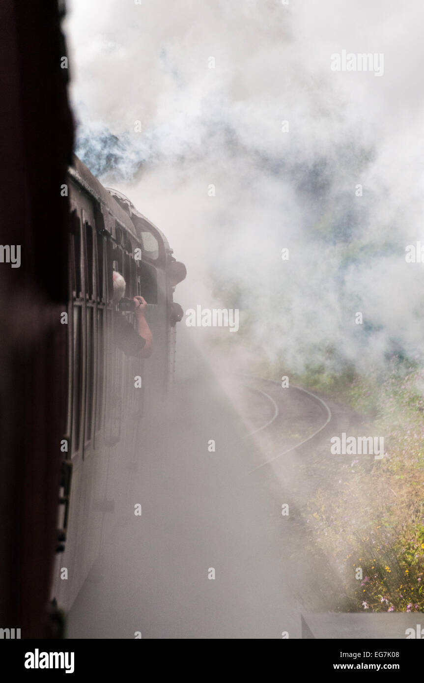 Looking out of a railway carriage window towards the steam loco at the ...