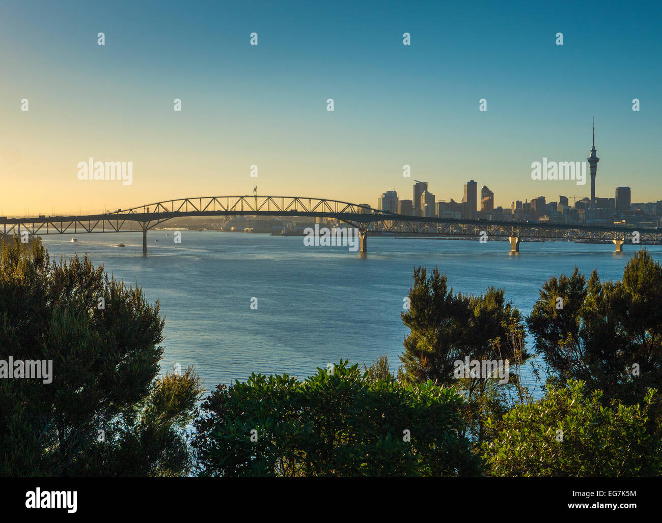 Auckland harbour bridge and Auckland city at sunrise from the north ...