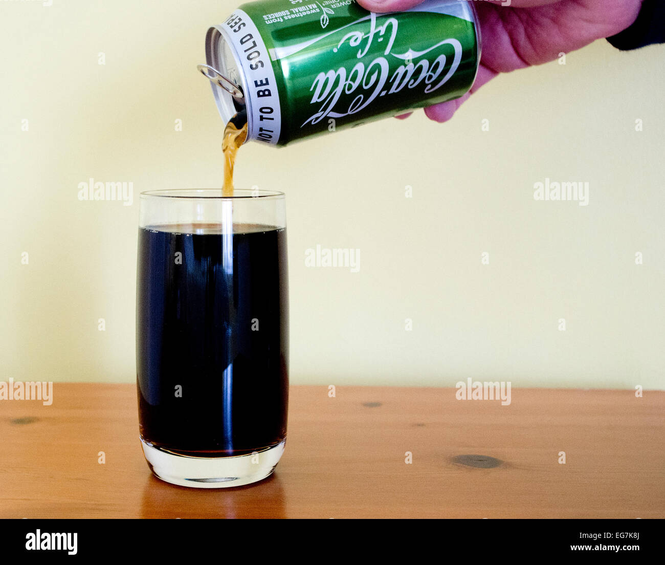 Caucasian Man Pouring a Coca-Cola Life Soft Drink Into A Glass MODEL ...