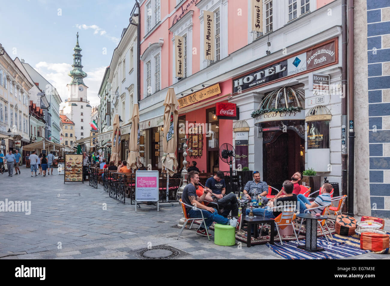 Tourists at a terrace cafe in Venturska Michalska the Old Town´s main ...