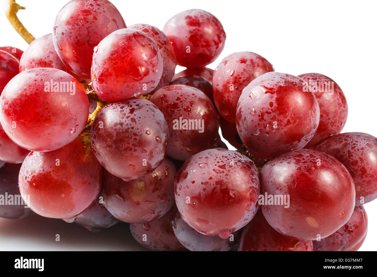 sweet pink grapes isolated on white background Stock Photo - Alamy