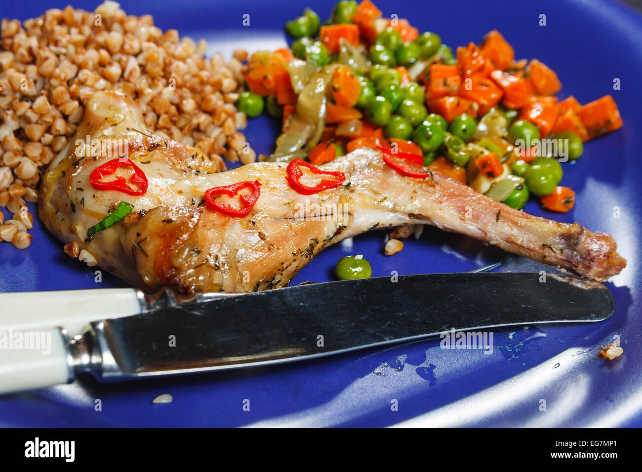 Baked rabbit legs with onion hi-res stock photography and images - Alamy