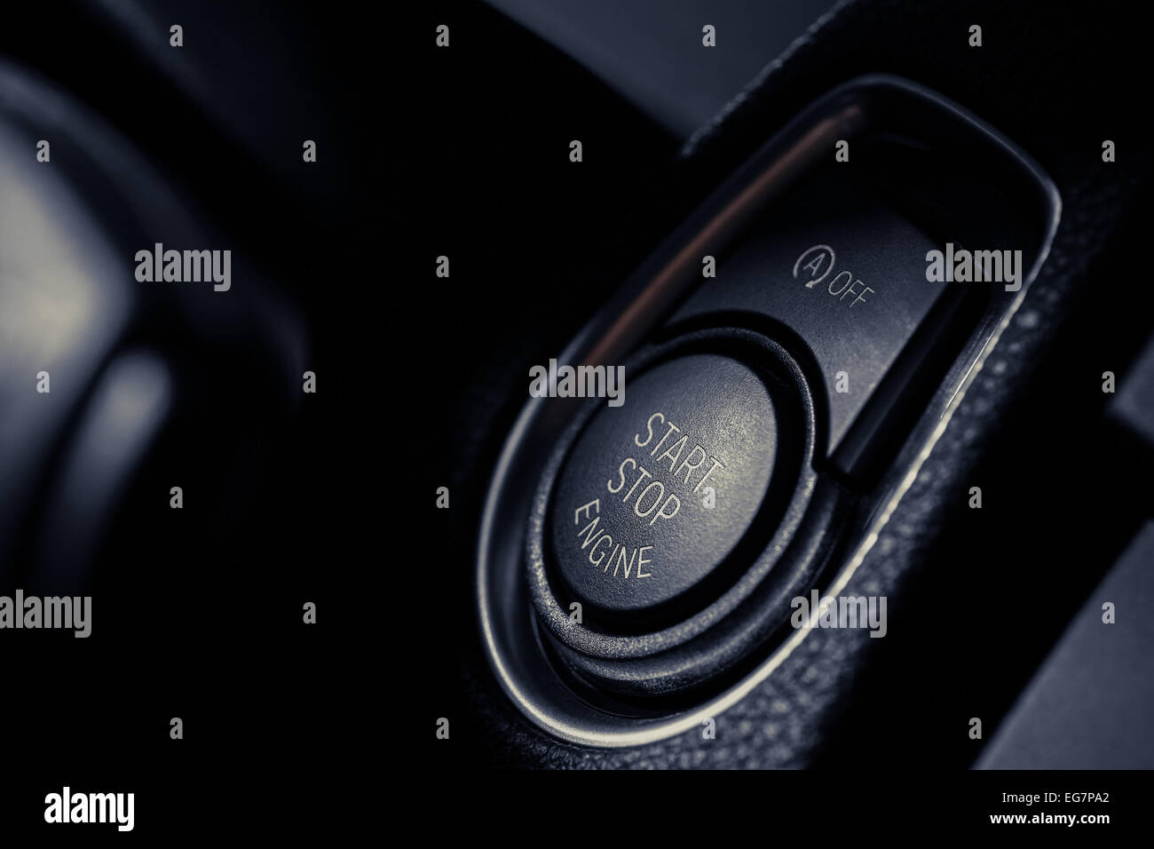 Detail on a black start button in a car Stock Photo - Alamy