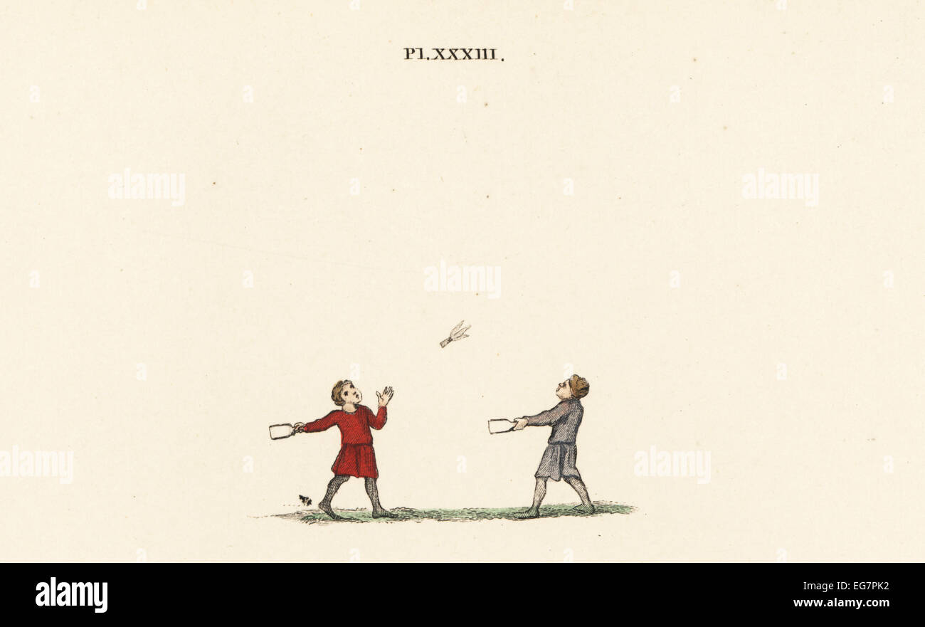 Medieval children's game of badminton with racquets and shuttlecock ...