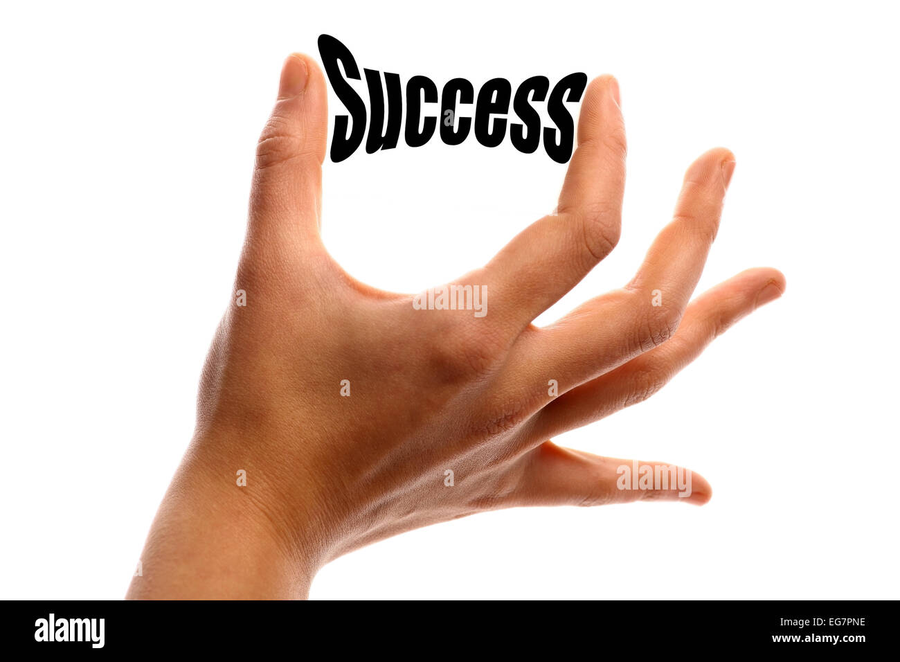 Horizontal shot of a hand holding the word "Success" between two ...