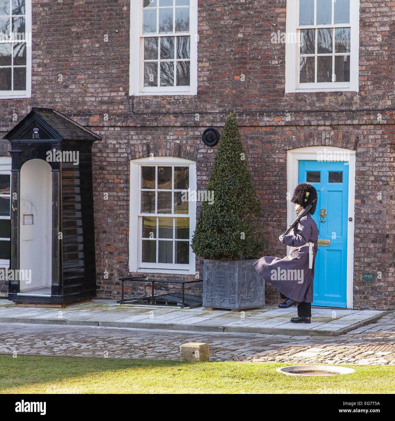 Irish guard on sentry duty standing to attention at the Tower of London ...